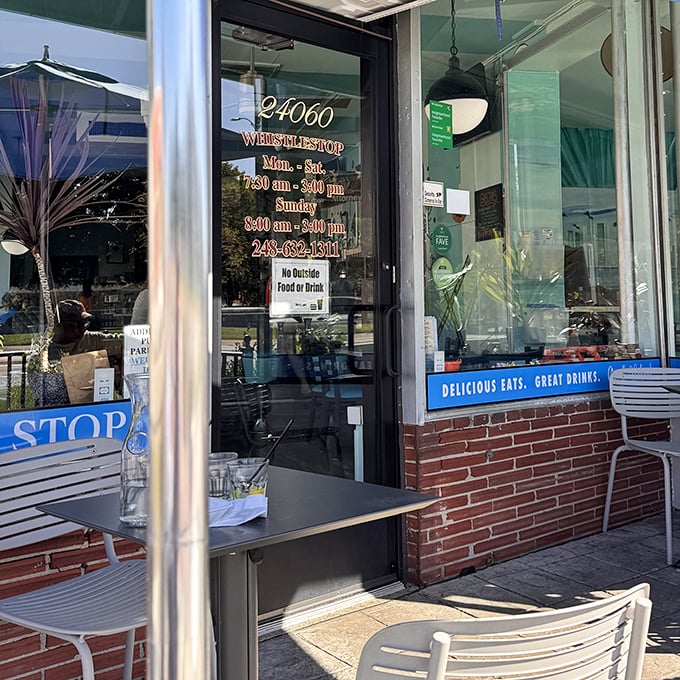 The door promises "Delicious Eats, Great Drinks" with the confidence of someone who knows they're not just making breakfast—they're creating memories.