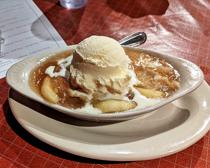 Apple cobbler à la mode: where warm fruit meets cold ice cream in a temperature tango that makes your taste buds want to dance along.