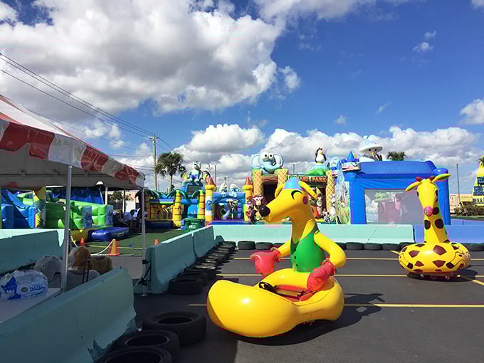 Inflatable attractions create a carnival atmosphere outside. Who knew shopping could include giant ducks and bouncy castles? The kids certainly approve.