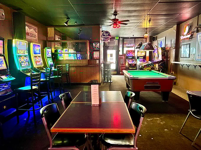 The game room—where video poker machines blink hopefully and the pool table waits patiently for your next move. This is where time slows down between bites.