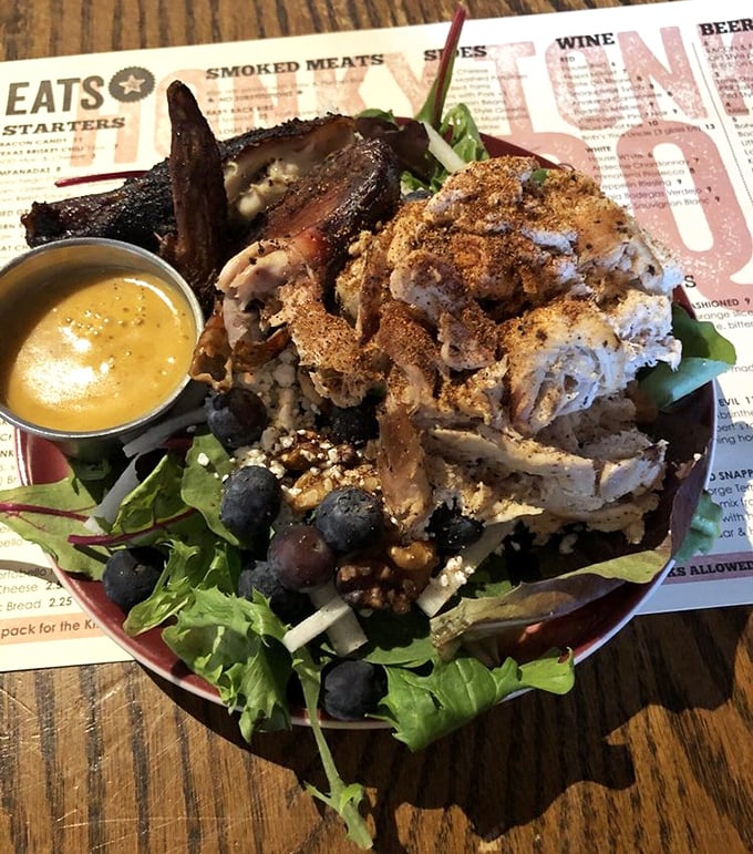 Even the salads get the royal treatment here, topped with smoked chicken that makes healthy eating feel like cheating.