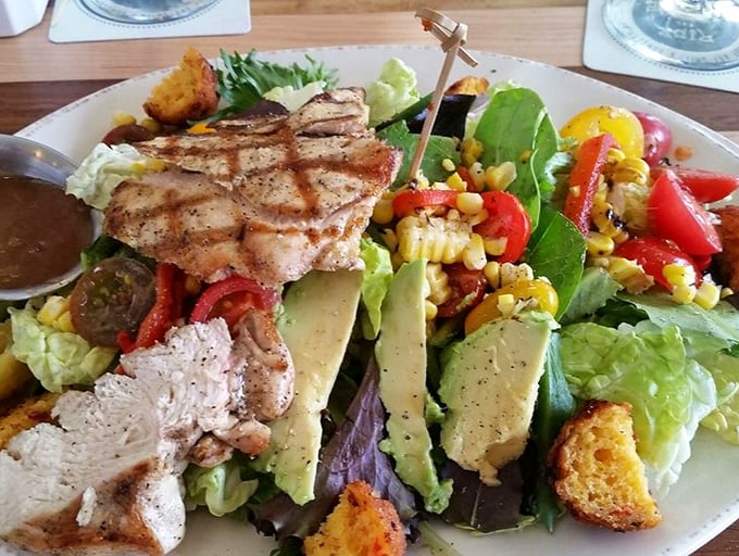 This isn't just a salad—it's proof that Southerners know their vegetables too, especially when topped with perfectly grilled chicken and fresh avocado.