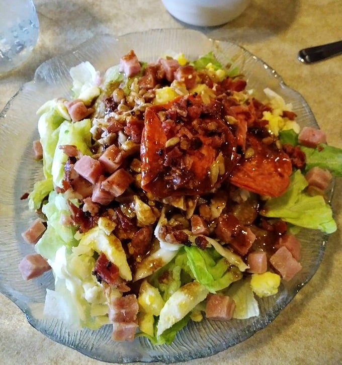 A salad that doesn't apologize for being hearty—loaded with toppings that transform "eating your vegetables" from chore to pleasure.