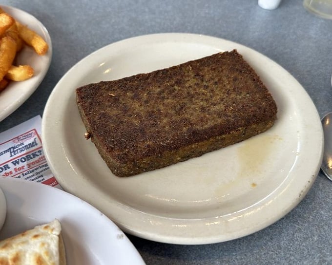 Scrapple – that mysterious Pennsylvania breakfast tradition that turns skeptics into believers with one perfectly crisped slice.