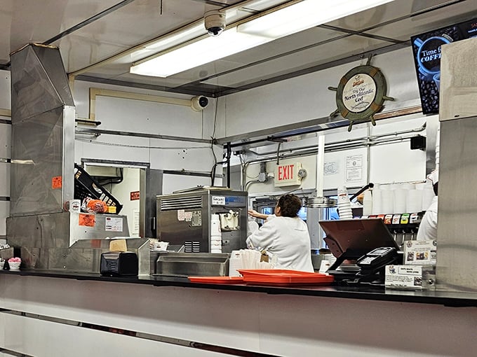 The open kitchen concept wasn't trendy when Kewpee adopted it—it was simply confidence in letting customers see exactly how their food is prepared.