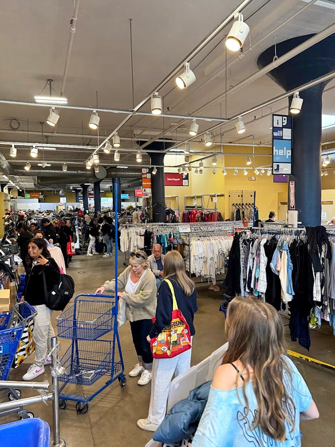 The weekend crowd knows the secret—Goodwill is where Boston's savvy shoppers find their treasures. The thrill of the hunt brings them together.