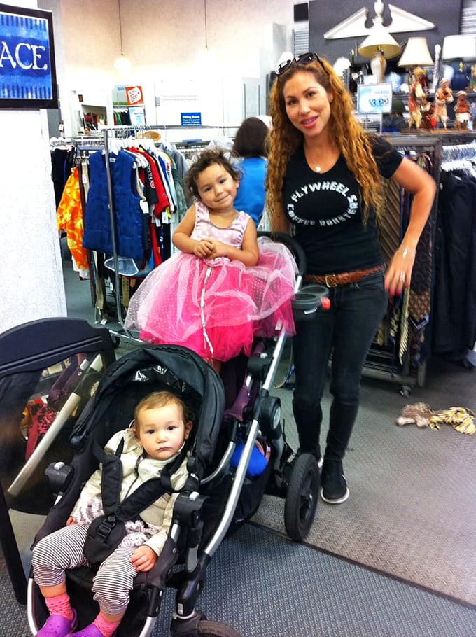 Families make thrifting a multi-generational treasure hunt. That little princess in pink has already mastered the art of the find.