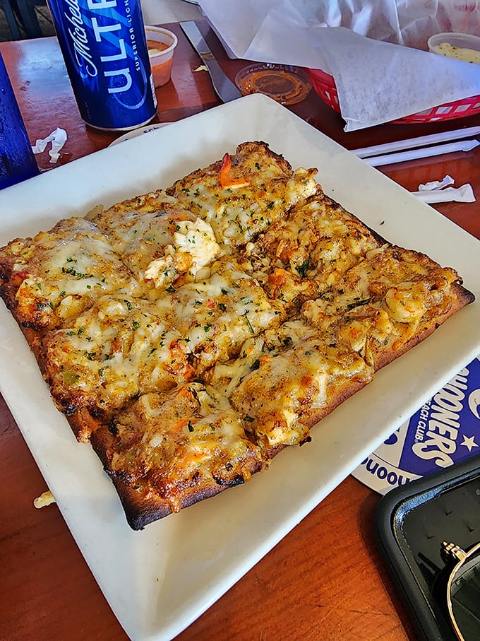 This cheesy flatbread could convert even the most dedicated seafood purist. Sometimes you need a break from ocean fare—this is that delicious break.