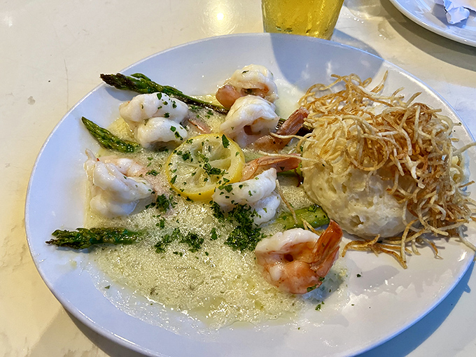 Shrimp scampi that makes you want to write thank-you notes to the ocean—buttery, garlicky perfection alongside crispy potato nests.