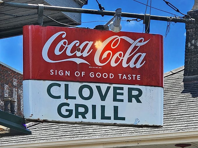 The vintage Clover Grill sign promises what generations of diners already know – you're about to experience a taste of authentic New Orleans.