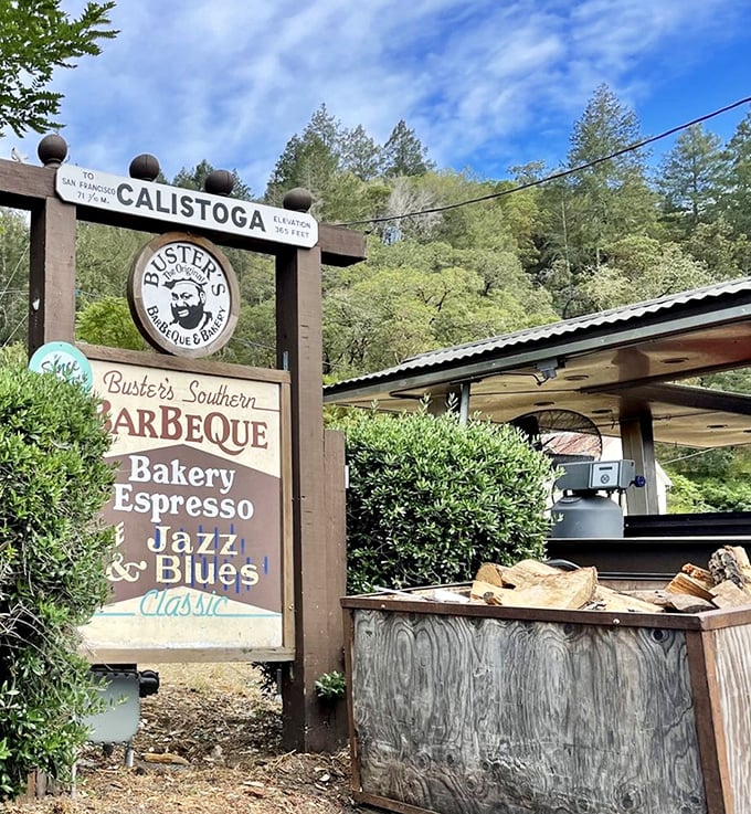 Buster's wooden sign stands as a rustic landmark, pointing hungry travelers toward BBQ salvation in the heart of wine country.