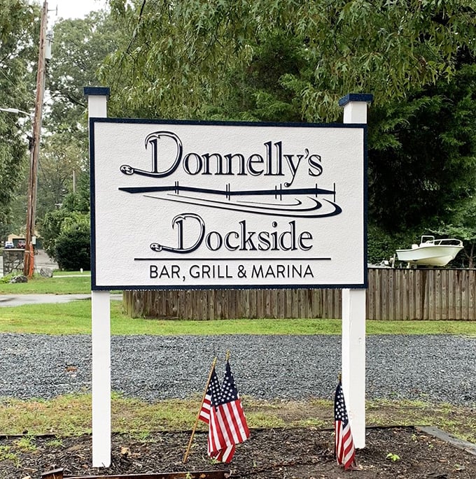The sign promises three things – bar, grill, and marina – and delivers on all fronts with Maryland charm.