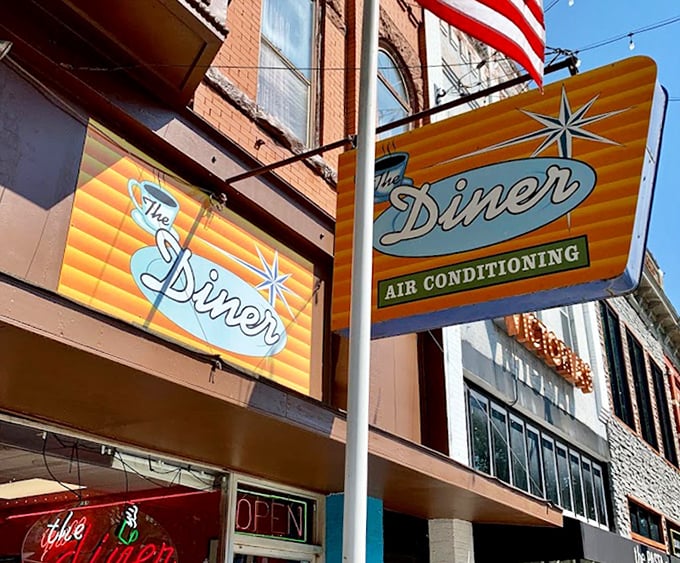 That gleaming retro sign—a Norman landmark that promises good food and zero pretension.