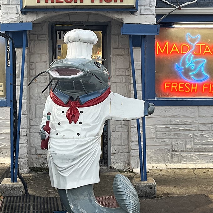 The catfish chef statue stands guard outside – a whimsical welcome that hints at the seafood magic happening inside this unassuming building.