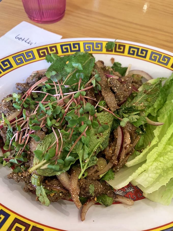 Steak salad dressed with herbs and that toasted rice powder adding nutty crunch—vegetables never looked this exciting or flavorful.