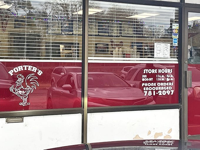 The rooster knows what's up. Porter's iconic window signage tells you everything you need to know—they're serious about chicken and proud of it.