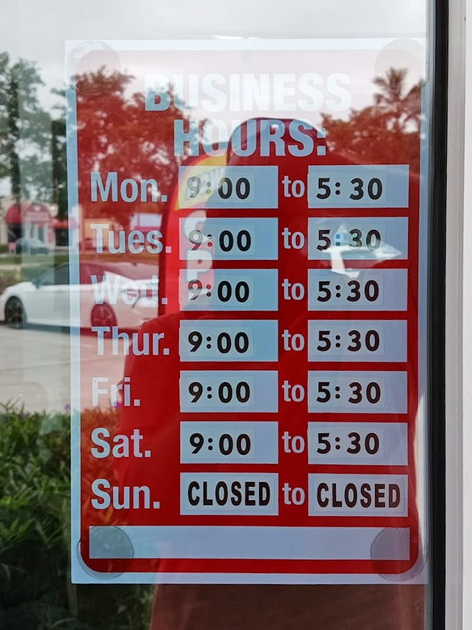 The store hours sign—a treasure map telling you exactly when to embark on your next bargain-hunting expedition.