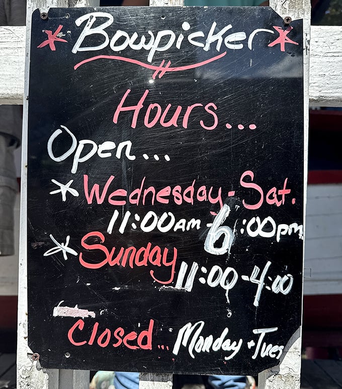 Operating hours written in chalk – old school and unapologetic. Plan accordingly or face the disappointment of an empty stomach.