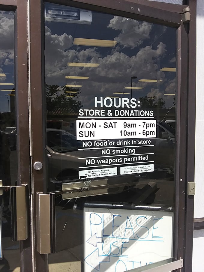 The rules of engagement: Goodwill's hours posted clearly on the door. The thrill of the hunt awaits seven days a week!