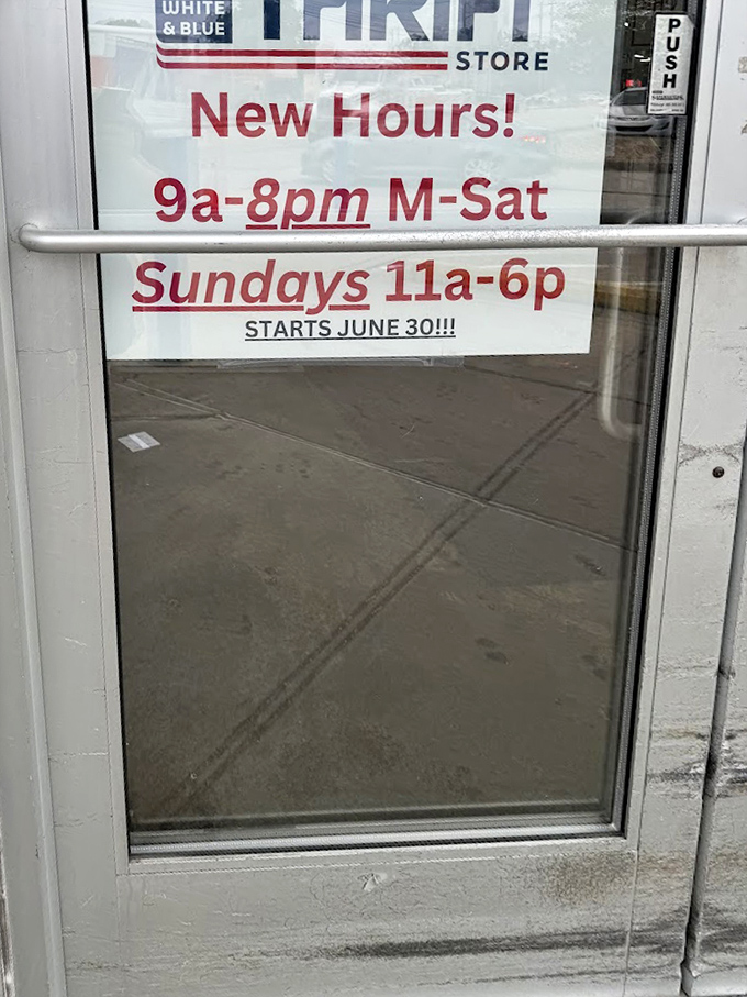 The store hours sign—the most important information for serious thrifters. Sunday shopping is the equivalent of a weekend treasure hunt championship.