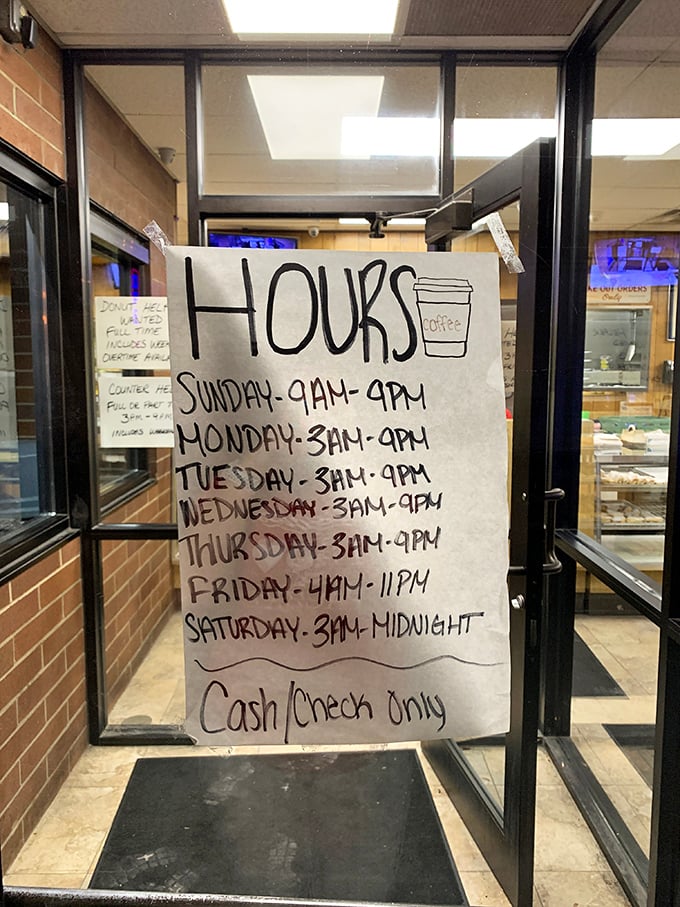 The handwritten hours sign tells you everything you need to know about Biagio's priorities: making great food, not fancy signage. Cash or check only—just like grandma's birthday cards.