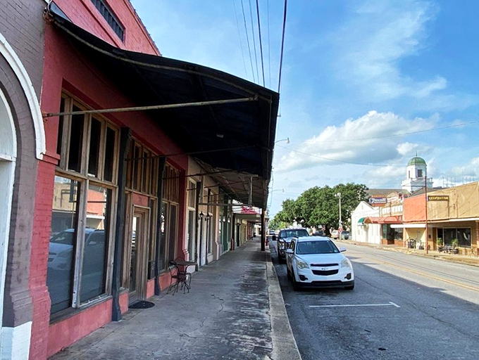 Abbeville's historic storefronts maintain their timeless appeal—a walkable downtown where window shopping doesn't trigger credit card alerts.