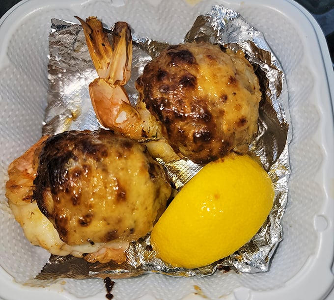 These aren't just stuffed shrimp—they're seafood engineering at its finest. The golden-brown exterior gives way to a heavenly crab-filled interior.