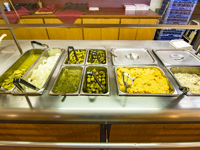 The sides station—where vegetables somehow become just as craveable as the meats they accompany.