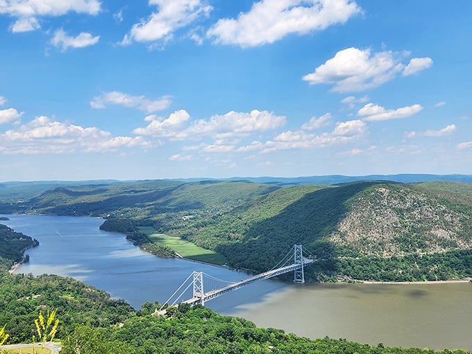 A view that makes you question city living. The Hudson River and Bear Mountain Bridge create a panorama worth every step of the climb.