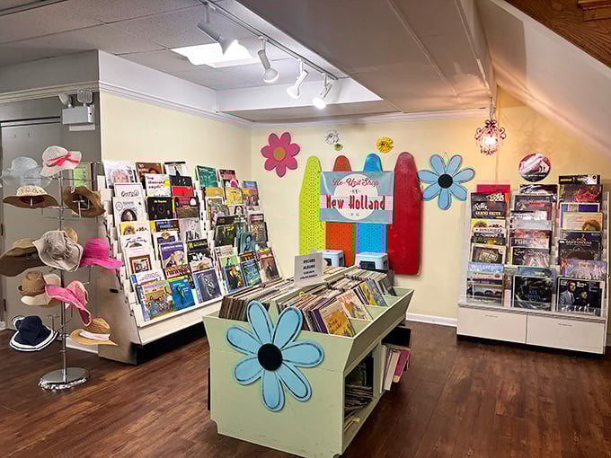 The children's media section blooms with flower decorations. Records, books, and nostalgia await in this colorful corner of childhood memories.