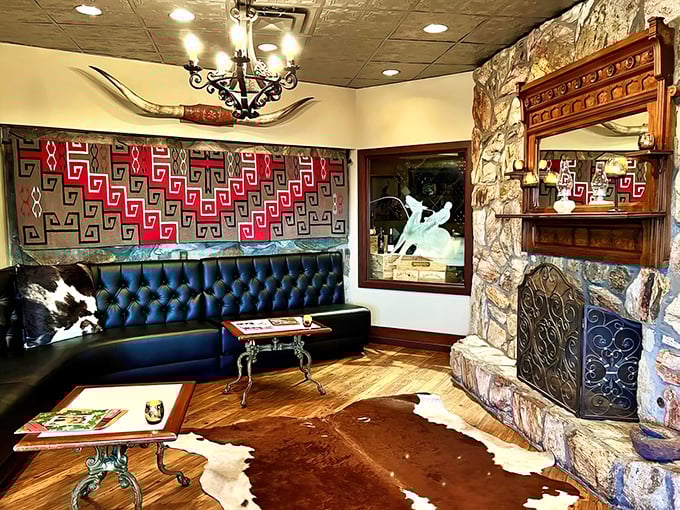 A waiting area that combines Southwestern textiles with cowhide—proving that comfort and authentic Western style aren't mutually exclusive.