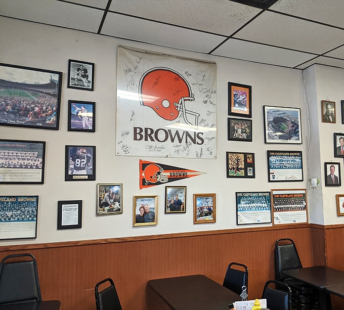 The Browns shrine that watches over lunch. In Cleveland, good sandwiches and football hopes spring eternal on these hallowed walls.