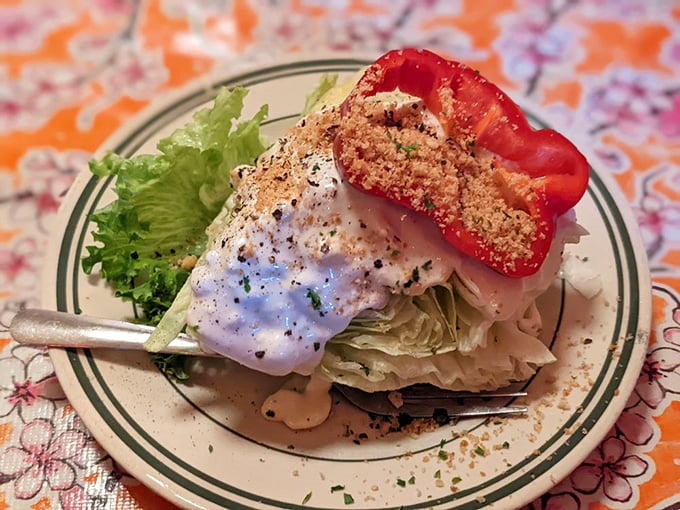 A wedge salad that reminds you vegetables can be exciting too, especially when dressed with care and topped with a perfectly roasted tomato.