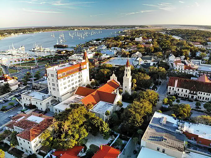 From above, St. Augustine reveals its perfect marriage of land and sea, where red-tiled roofs meet blue waters in a centuries-old romance.