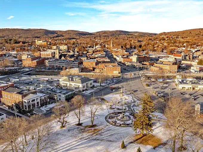 This aerial view reveals Torrington's perfect positioning—nestled in Connecticut's hills with enough development for convenience but enough nature for serenity.