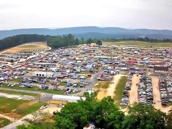 From this bird's eye view, the true scale of Mountain Top reveals itself—a temporary city of commerce nestled against Alabama's rolling landscape.