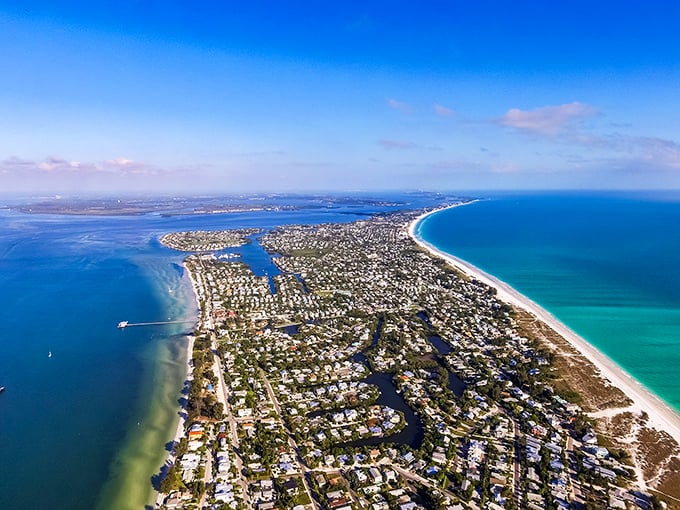 Anna Maria Island from the sky reveals its perfect positioning – nestled between Gulf and bay waters like Florida's best-kept secret hiding in plain sight.
