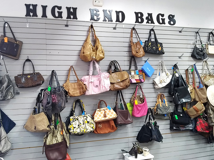 The "High End Bags" wall—where designer purses get their second chance at love with a new shoulder to ride on.