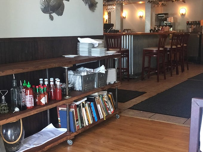 The bar area—where strangers become friends and friends become regulars over glasses of whatever helps the day go down easier.