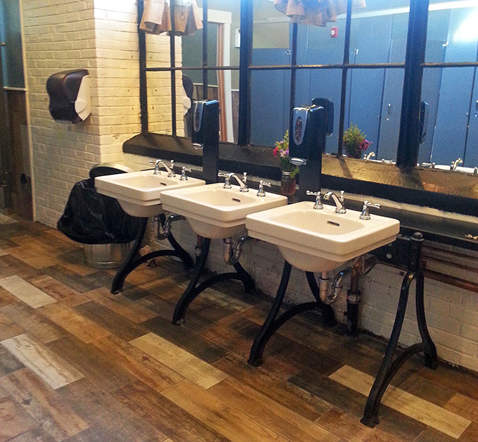 Even the bathroom sinks have character—vintage-style fixtures that remind you this place respects tradition in every detail. BBQ authenticity extends everywhere.