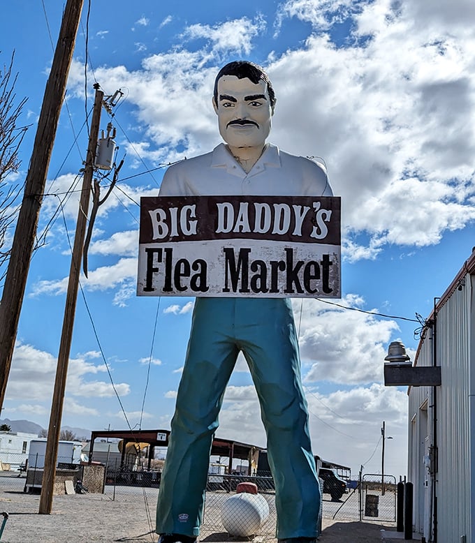 The iconic Big Daddy himself stands tall against the New Mexico sky—a fiberglass sentinel guarding his kingdom of secondhand treasures.