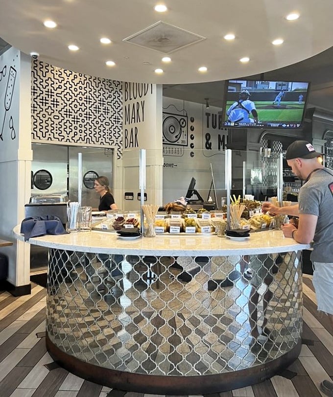 The Bloody Mary bar isn't just a condiment station—it's an adult playground where garnish dreams come true and breakfast becomes an adventure.
