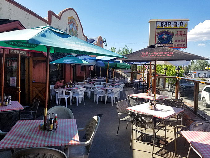 Bodie Mike's outdoor dining area – where checkered tablecloths and mountain air combine to make even simple barbecue taste like a special occasion.
