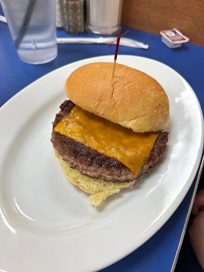 The cheeseburger—America's most perfect food invention. This one's simple, honest, and exactly what you hoped it would be when you ordered it.