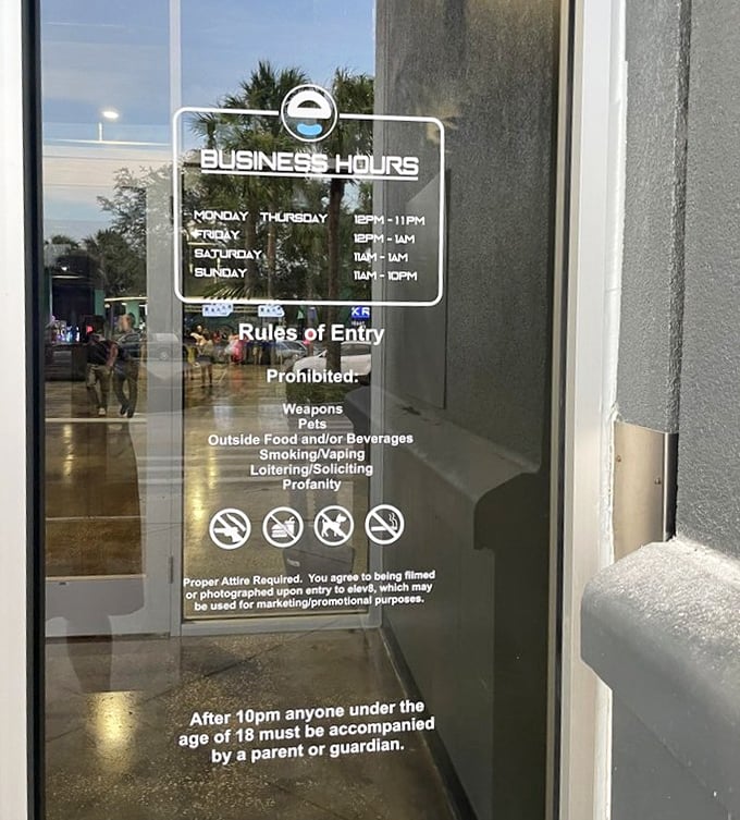 Business hours posted clearly on the entrance—because even in a world of fun, someone has to be the responsible adult who tells you when it's time to go home.