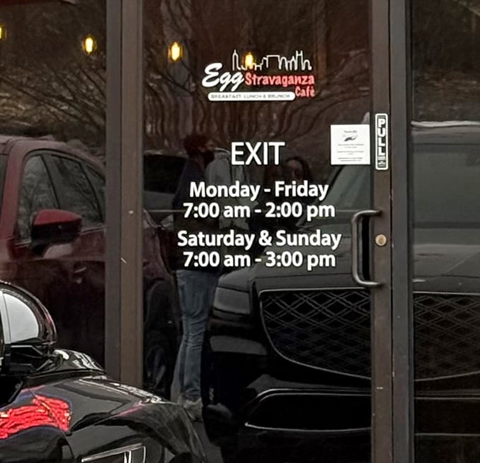The hours posted like a promise—seven mornings a week, they'll be here waiting with coffee brewing and griddles hot. Breakfast salvation awaits.