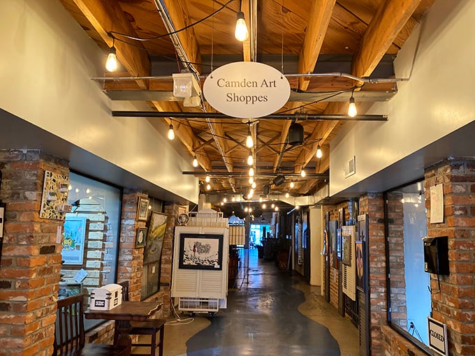 Camden Art Shoppes' exposed brick and wooden beams create a gallery where creativity isn't just displayed—it's structurally necessary, like support columns for the soul.
