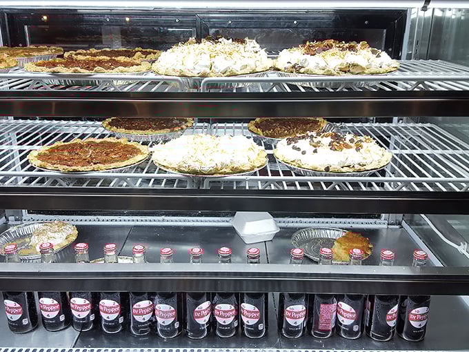 The dessert case—where willpower goes to die. Those pies aren't just baked, they're engineered for maximum happiness delivery.