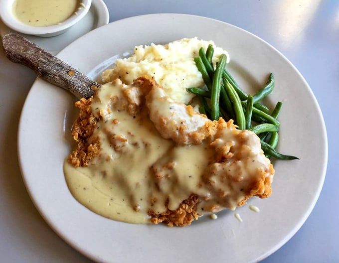Chicken fried steak's soulmate is this pepper cream gravy – a velvety blanket of comfort that transforms fried meat into a religious experience.
