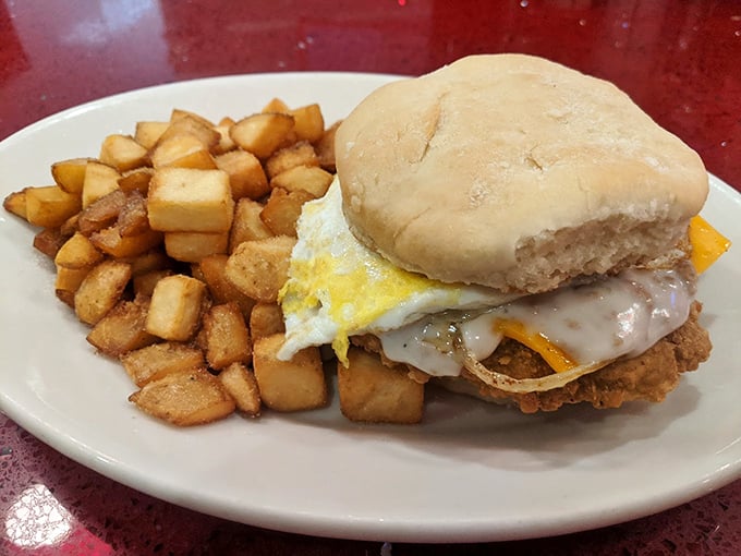 The breakfast sandwich that makes you question why you'd ever settle for fast food again – complete with home fries that mean business.